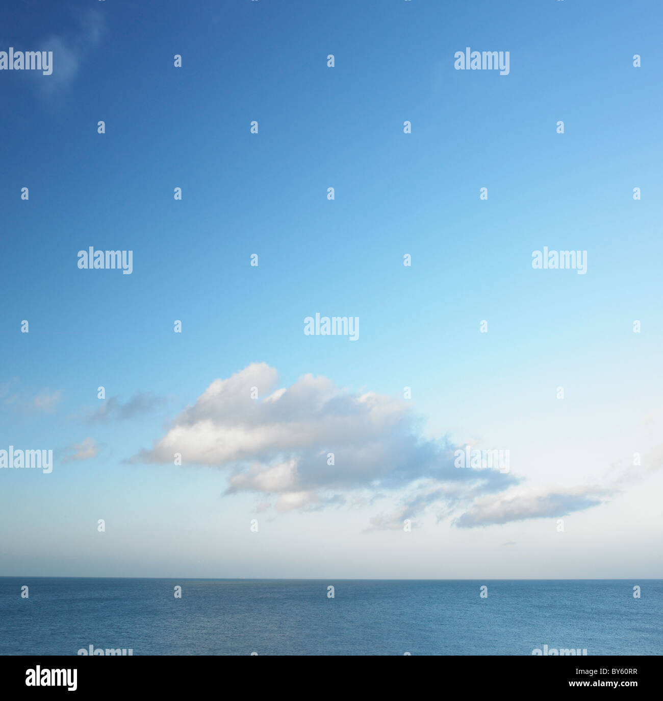 sea and sky with some clouds Stock Photo - Alamy