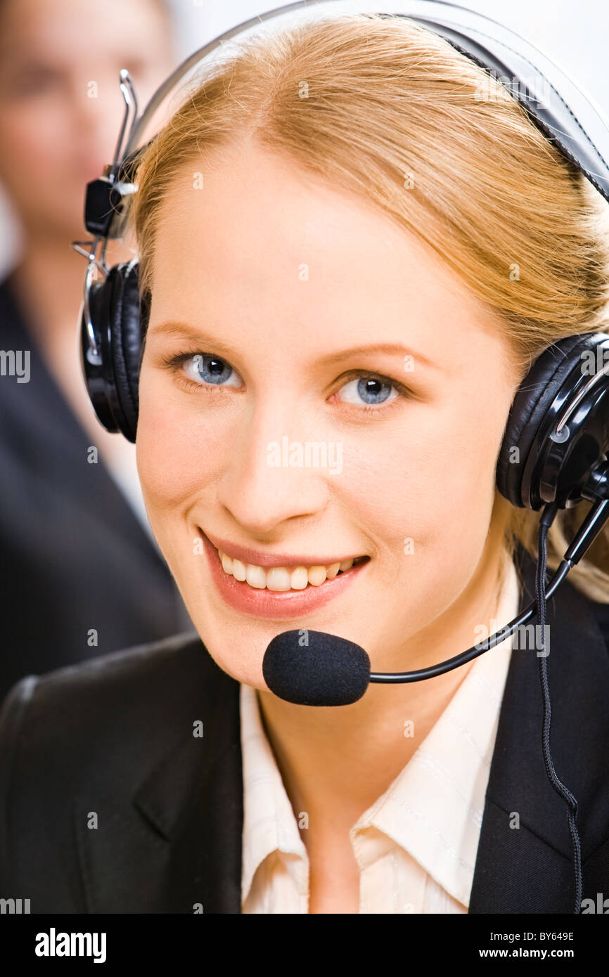 Face of young smiling confident consultant with blue eyes Stock Photo ...