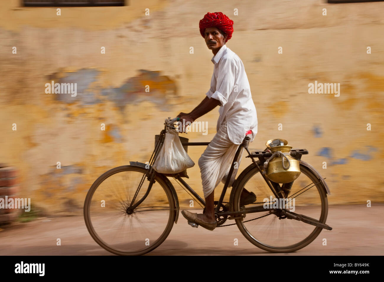 Milkman on bicycle, Bundi, Rajasthan, India Stock Photo - Alamy