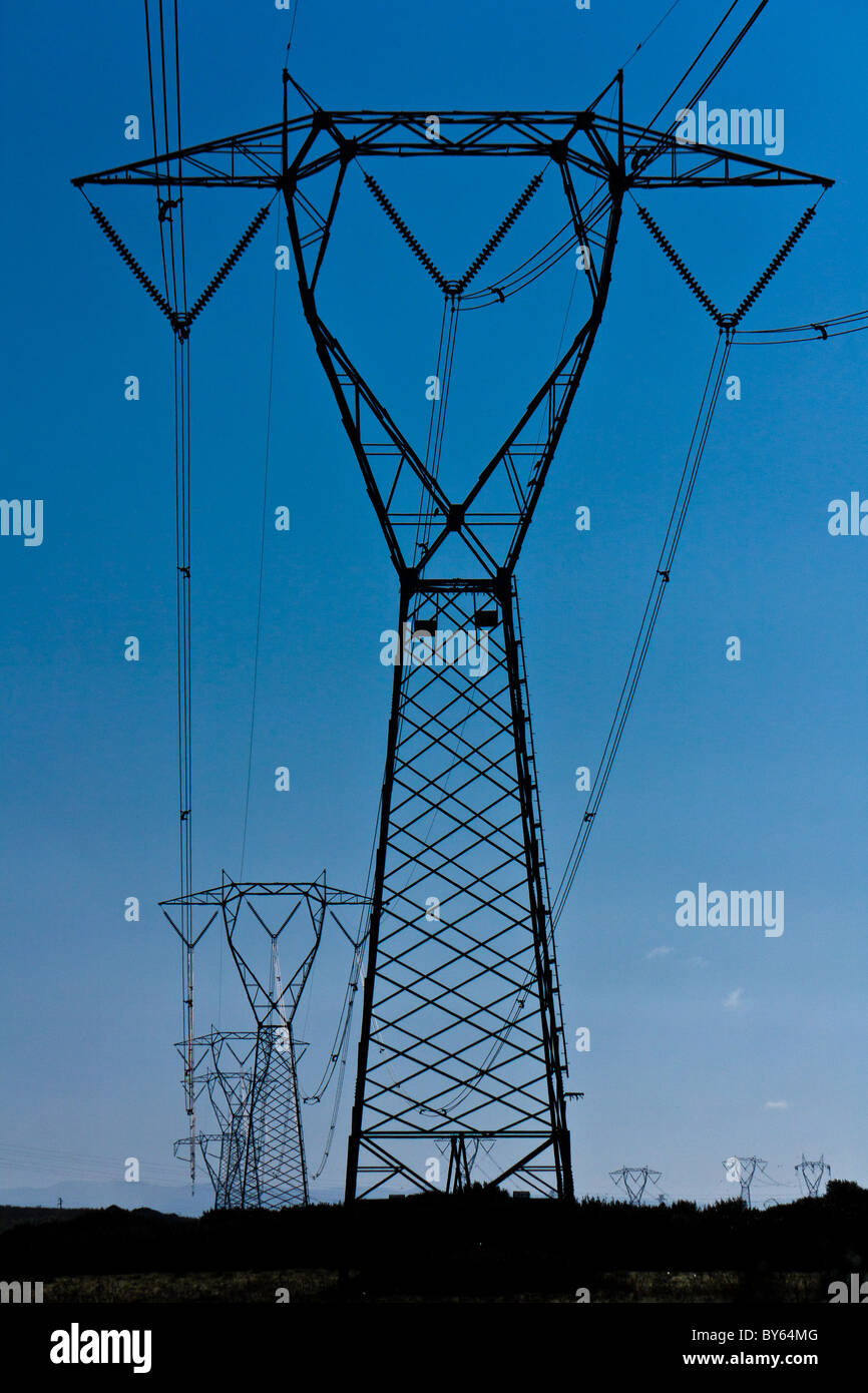 power lines and lattices silhouettes in perspective Stock Photo - Alamy