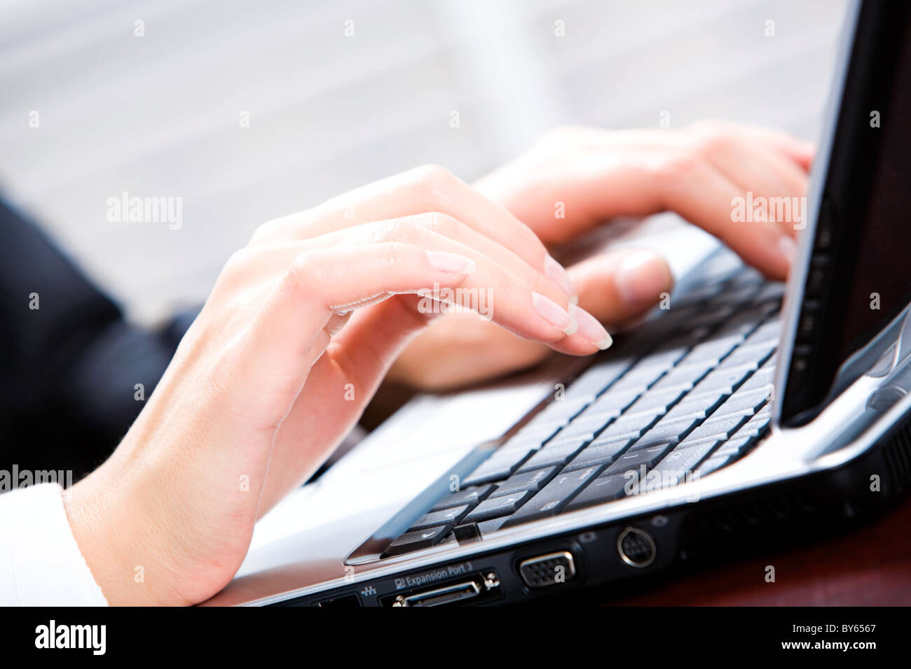 Creative image of human hands using a laptop Stock Photo - Alamy