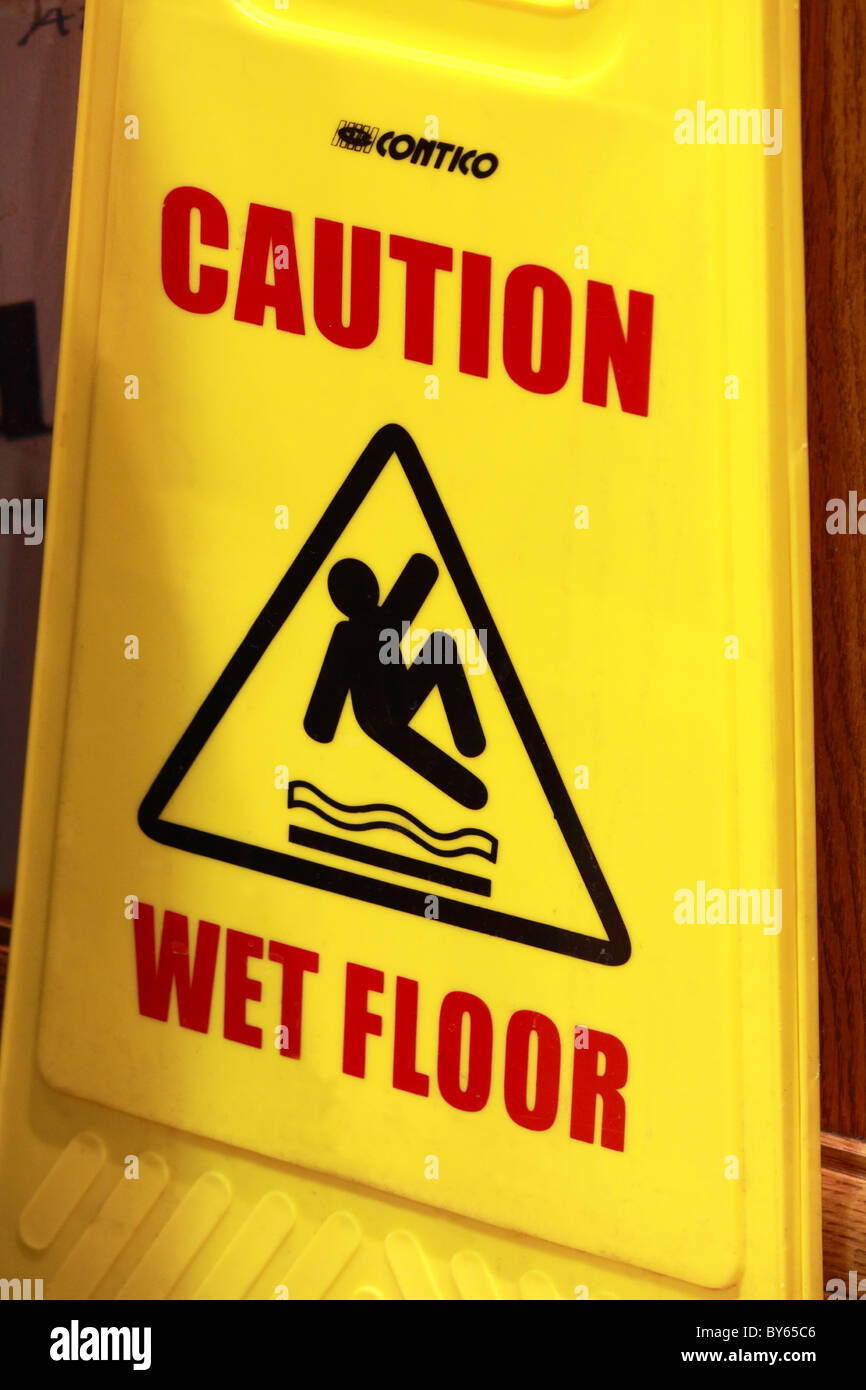 Wet floor health safety sign hi-res stock photography and images - Alamy