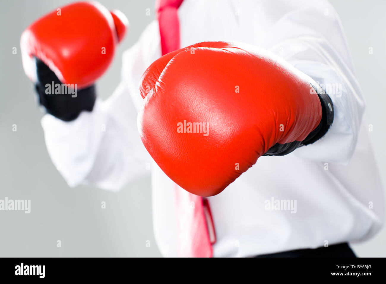 Symbolic image of punch of a angry business man Stock Photo - Alamy