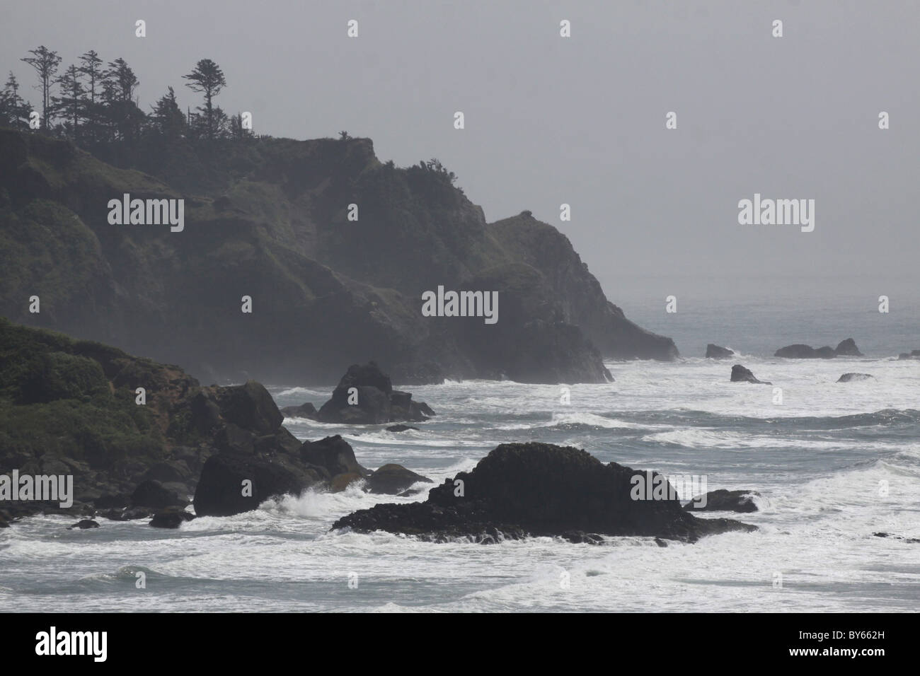 cliffs rocks fog Oregon Coast bay Pacific Coast Trail Stock Photo - Alamy