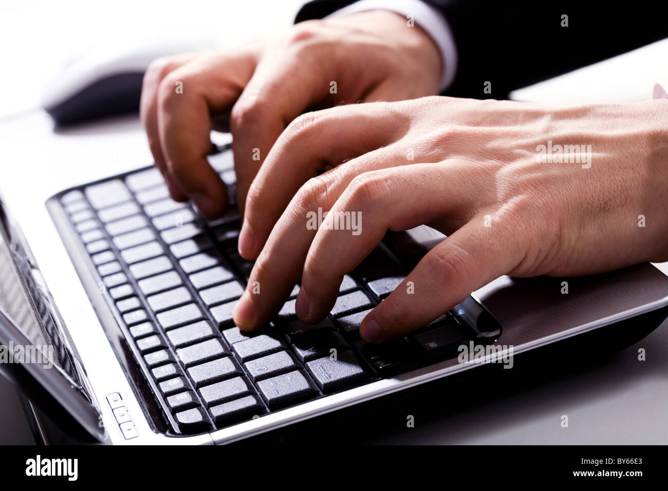 Horizontal image of typing human hands Stock Photo - Alamy
