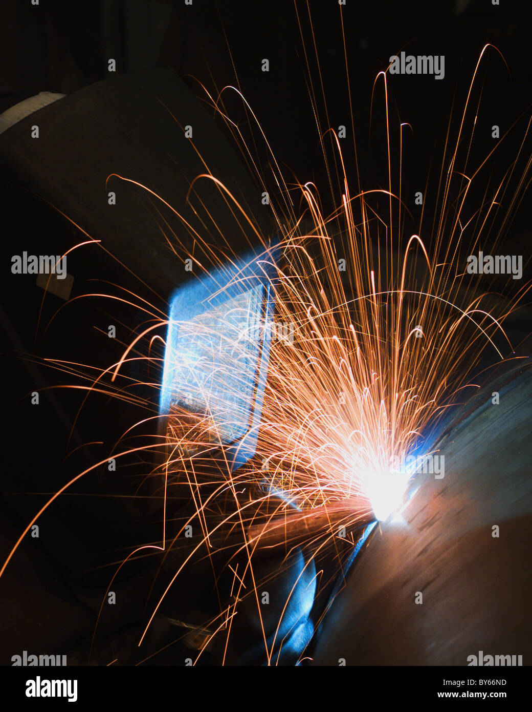 A welder welding the top on a pressure vessel Stock Photo - Alamy