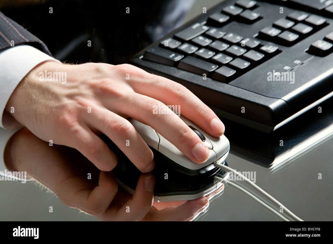 Hands pressing computer keyboard mouse hi-res stock photography and ...
