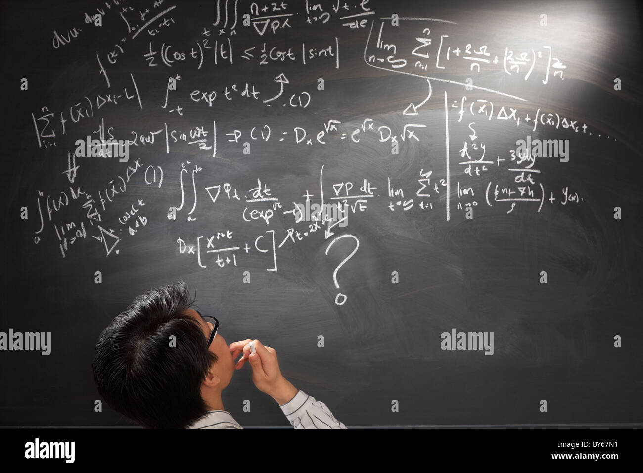 Looking at difficult complex mathematics equation on balckboard Stock ...
