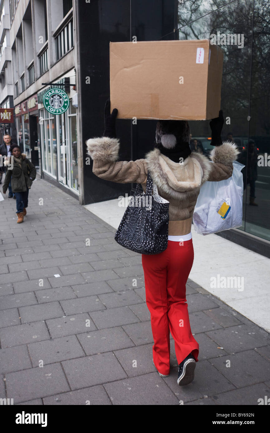 Balancing box on head hi-res stock photography and images - Alamy