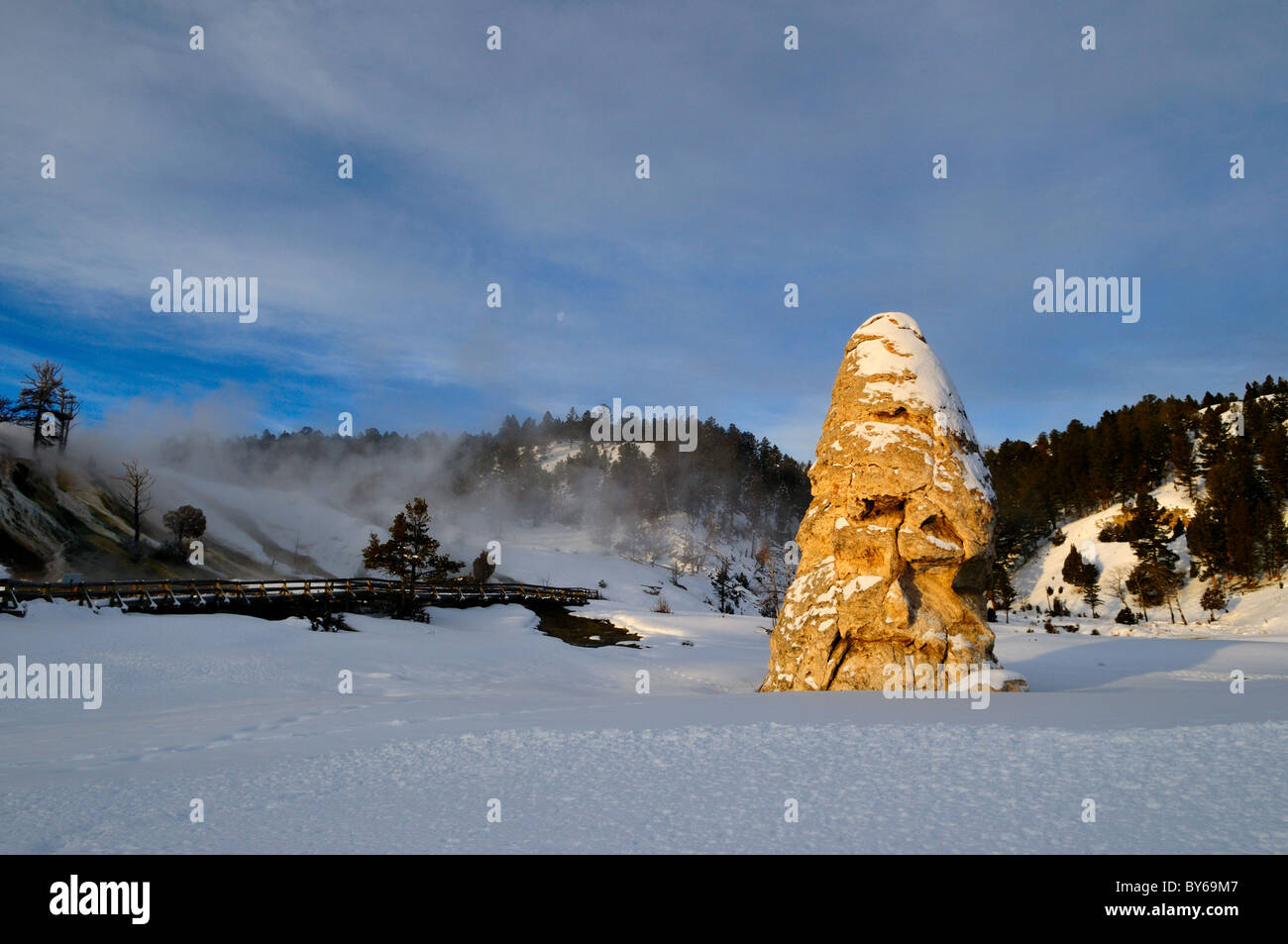 The Liberty Cap covered in snow. Mammoth Hot Springs, Yellowstone ...