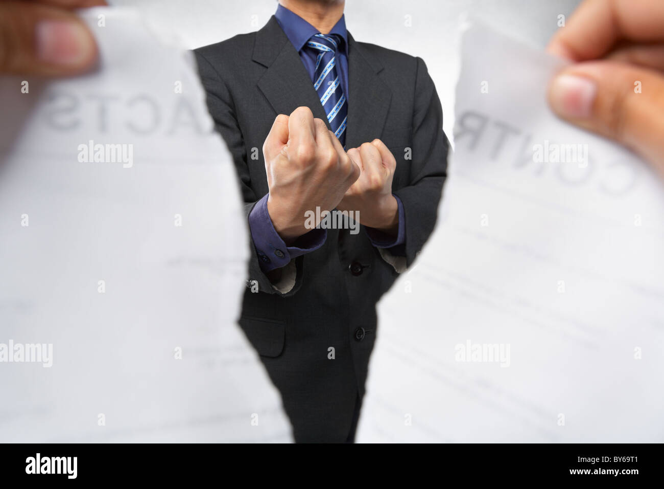 Businessman showing fighting pose when the contract tearing out Stock ...