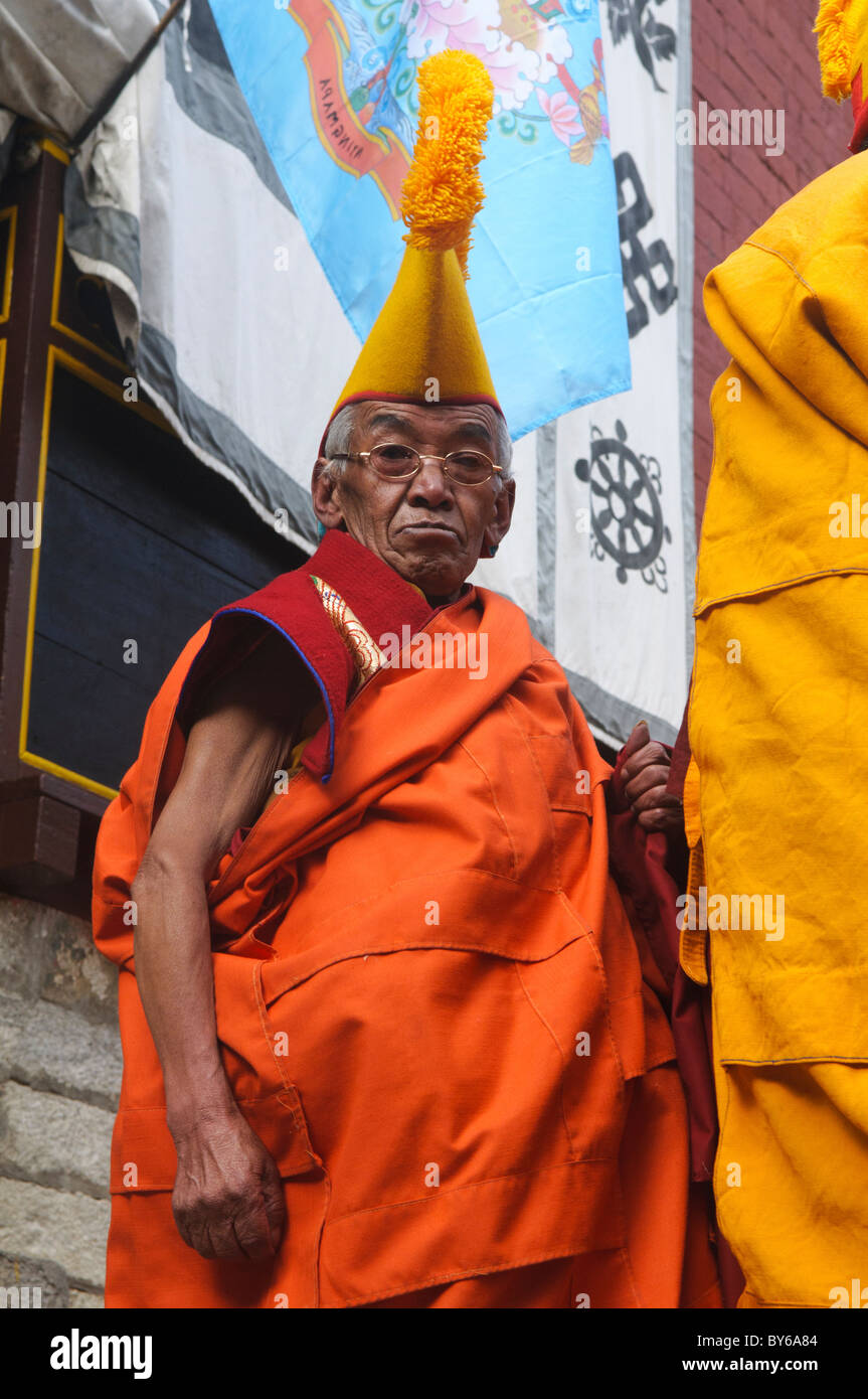 yellow hat Gelugpa monk at the Mani Rimdu Festival at Tengboche ...