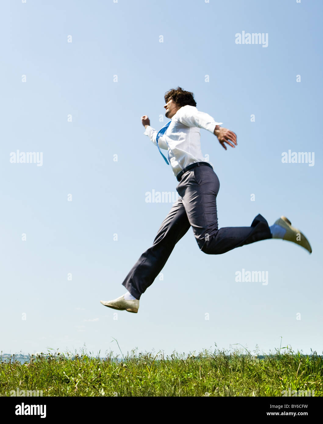 Image of hastening businessman running to business meeting Stock Photo ...