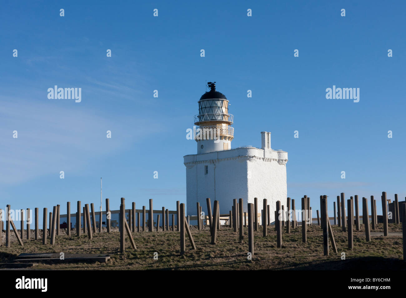 Fraserburgh Lighthouse with old fishing net drying poles Stock Photo ...