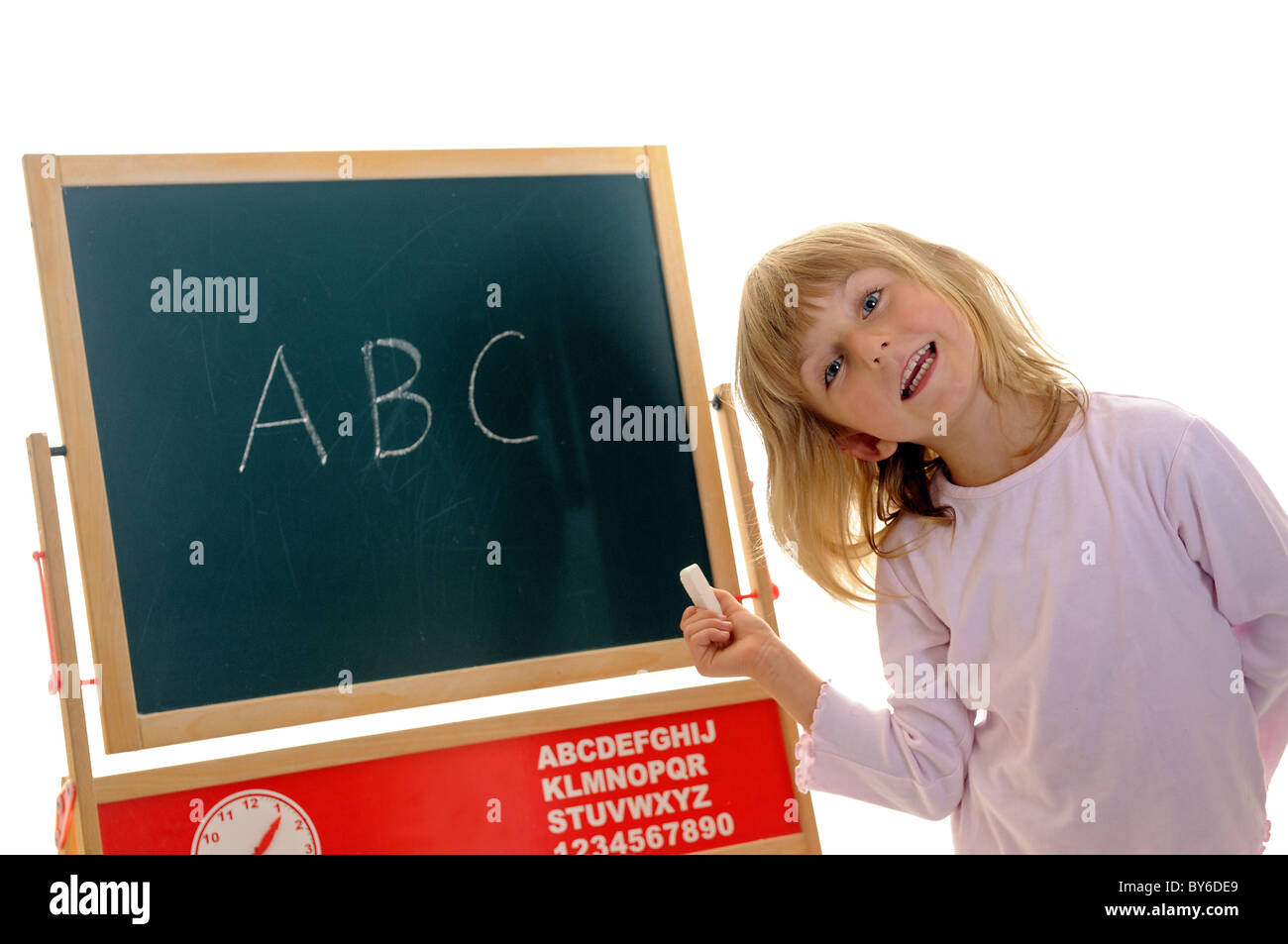 First class girl with chalkboard Stock Photo - Alamy