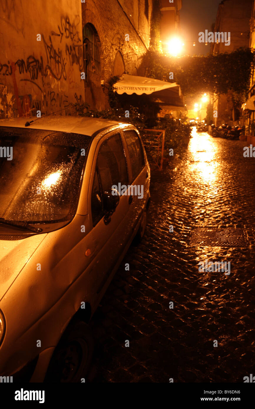 rain in trastevere area at night, rome, italy Stock Photo - Alamy