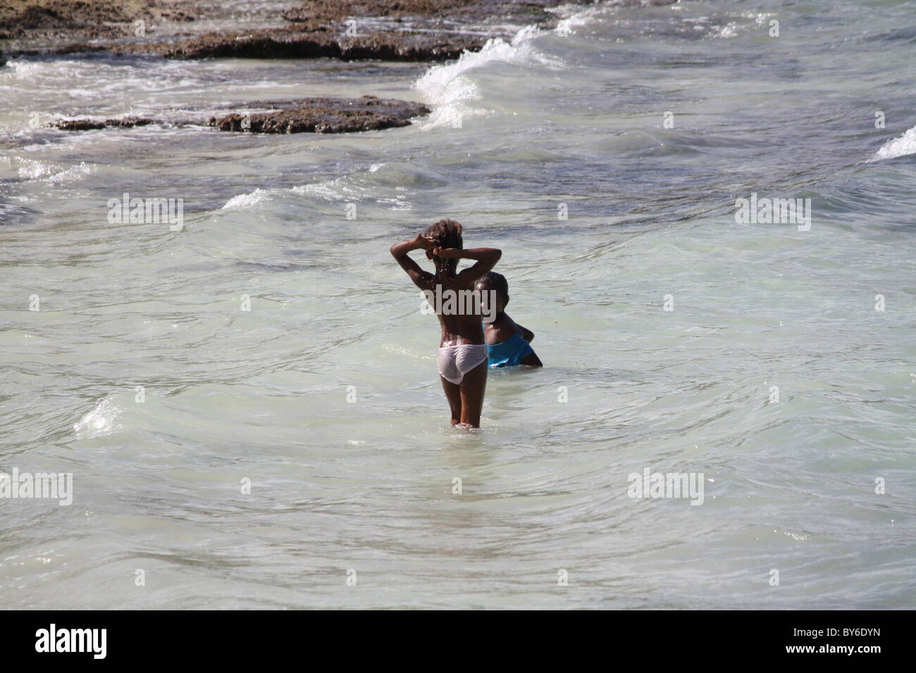 Children swimming in the ocean Stock Photo - Alamy