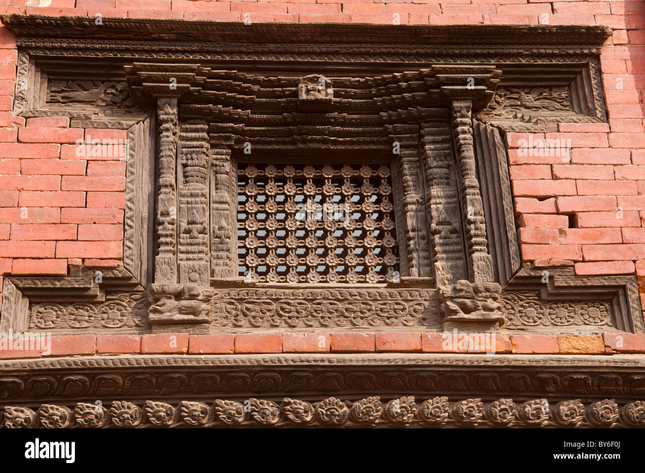 carved wooden window at the Royal Palace in ancient Patan, near ...