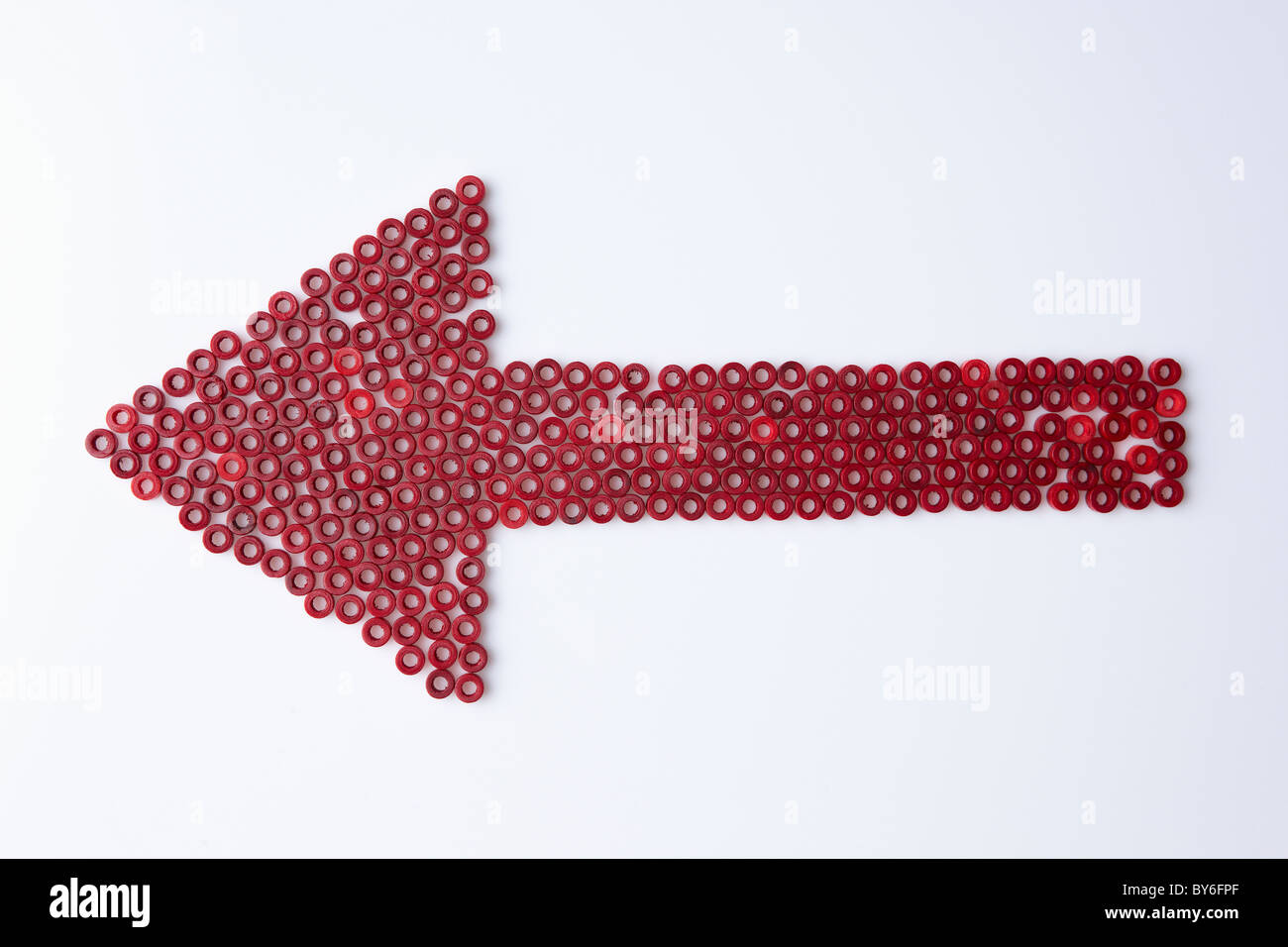 Arrow sign in red color Stock Photo - Alamy