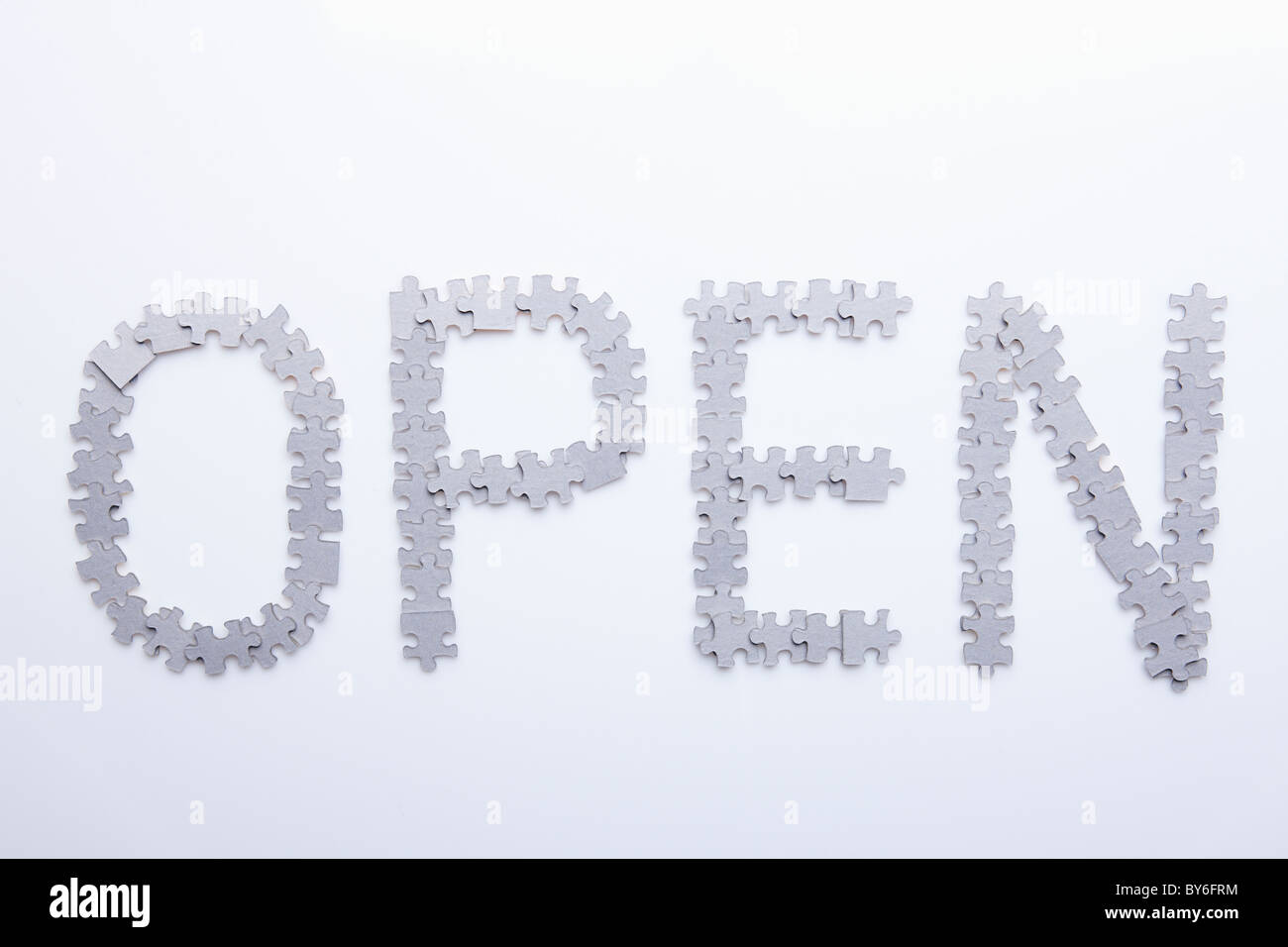 OPEN words made by puzzle pieces Stock Photo - Alamy