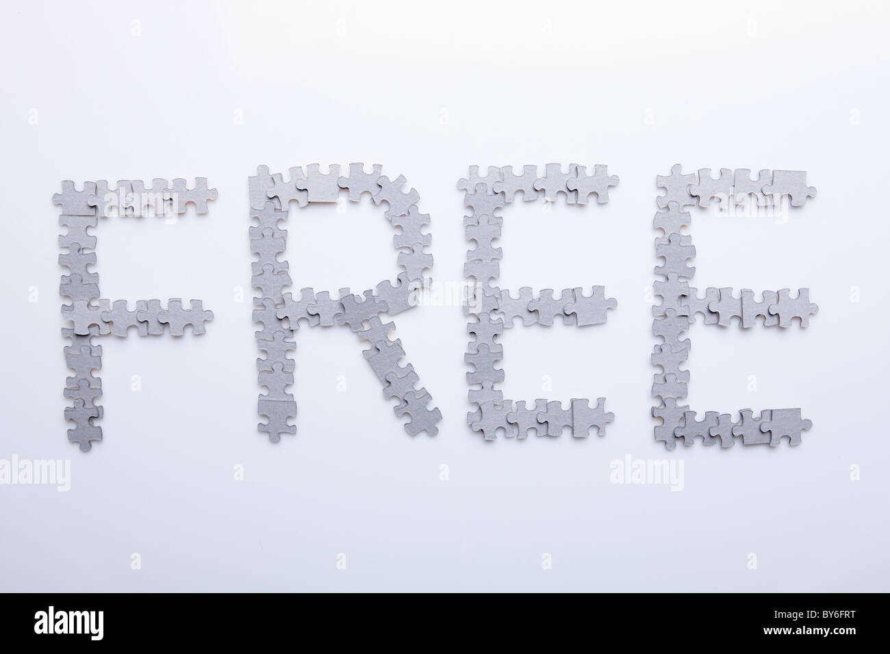 FREE words made by puzzle pieces Stock Photo - Alamy