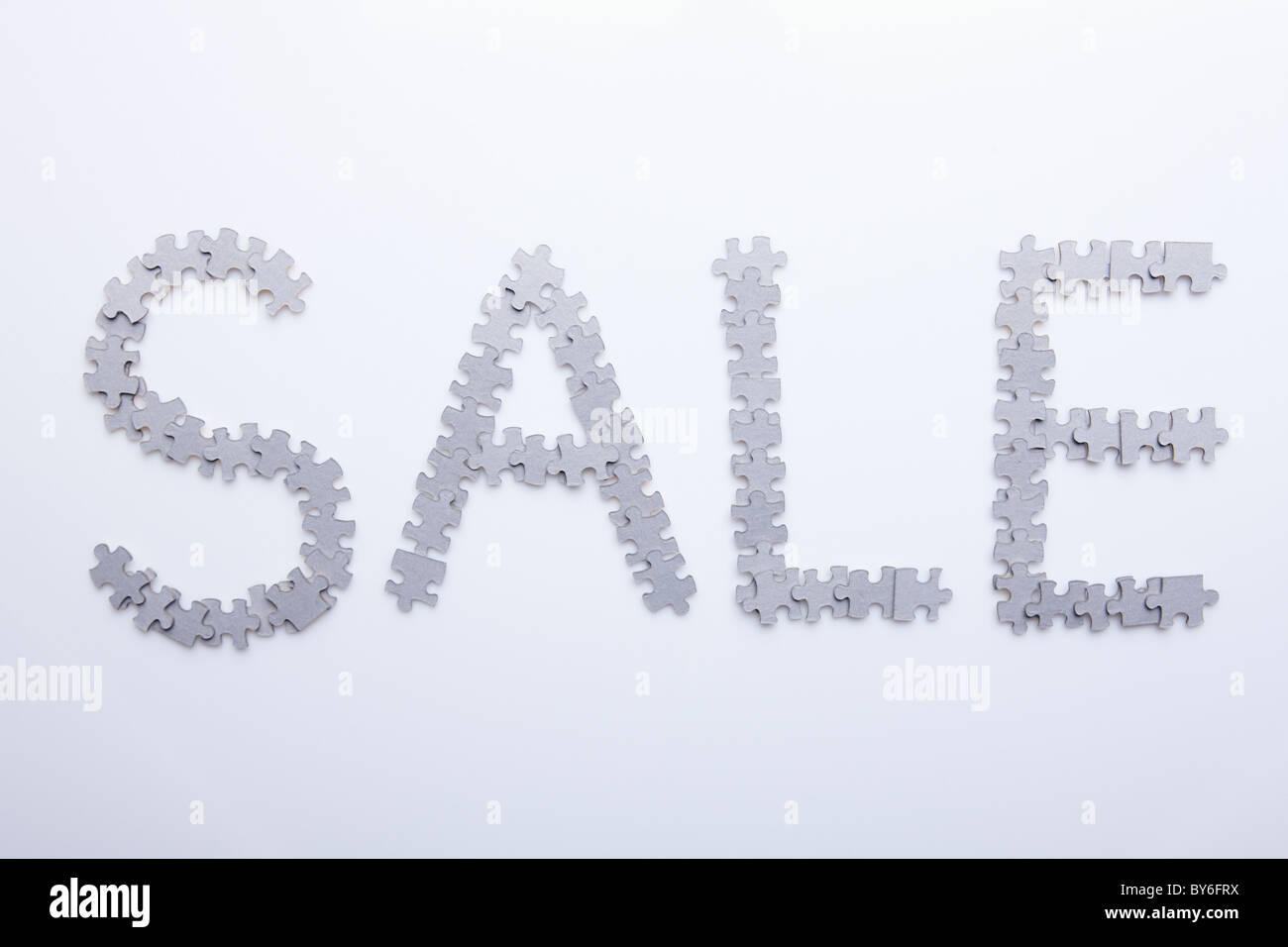 SALE words made by puzzle pieces Stock Photo - Alamy