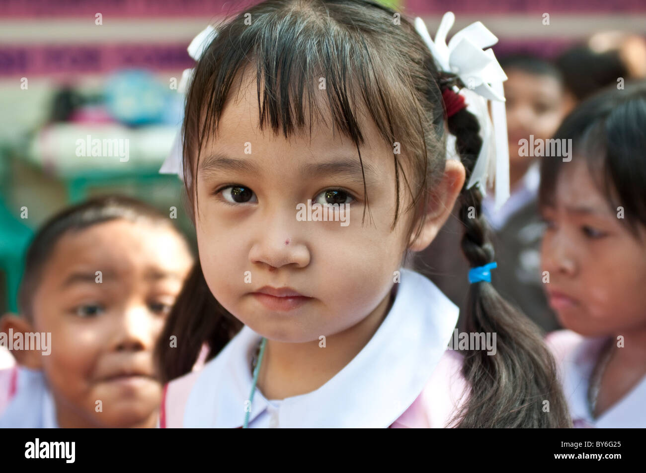 Girl's face during School assembly at a bilingual school, Bangkok ...
