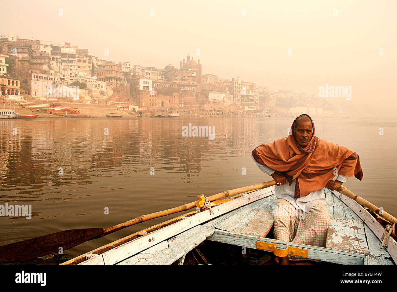 Indian boatman on the holy river Ganges, Varanasi, India Stock Photo ...