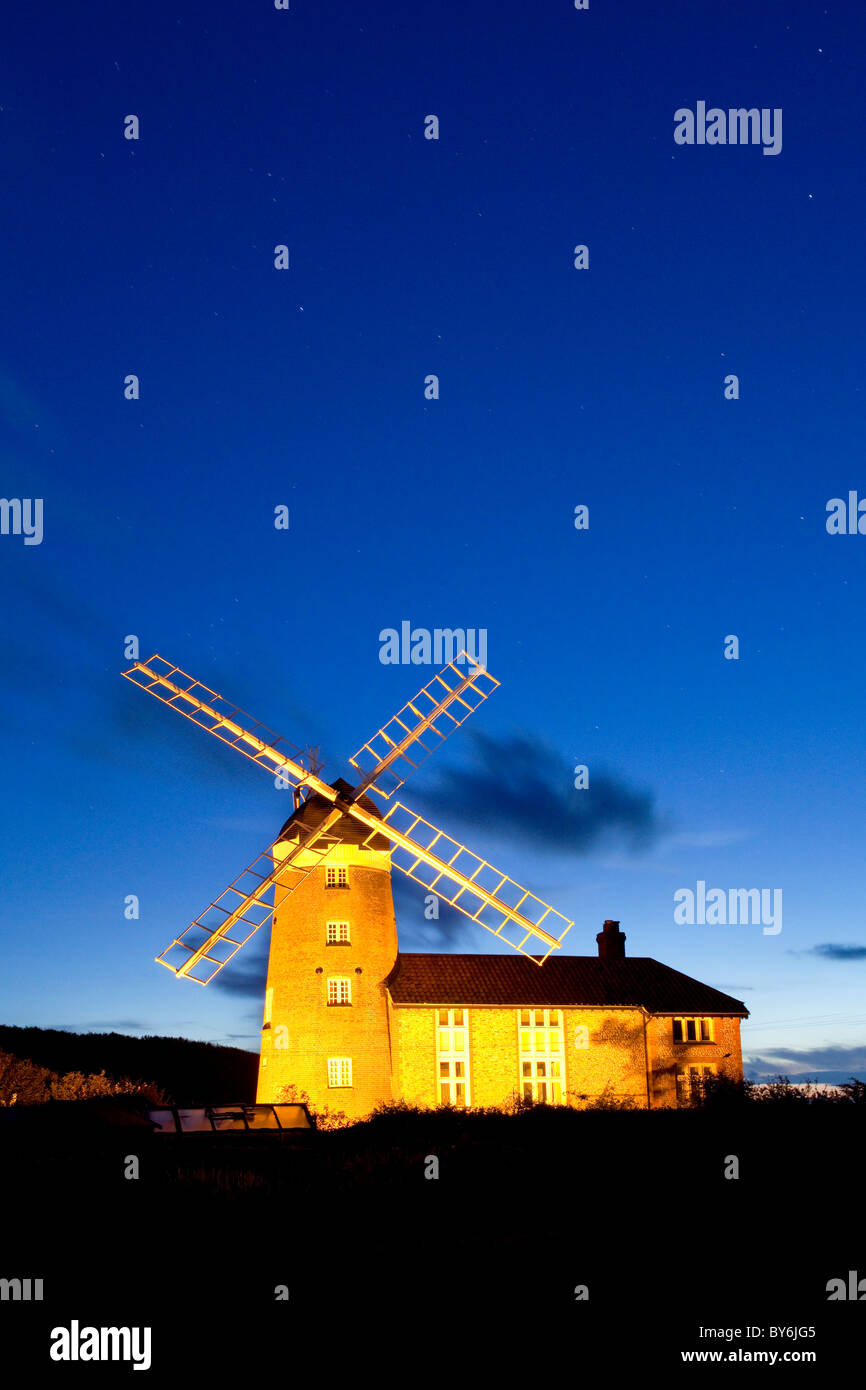 Weybourne windmill illuminated by floodlights at dusk on the Norfolk ...
