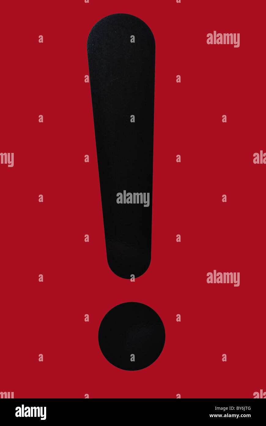 black exclamation point on a red background Stock Photo - Alamy