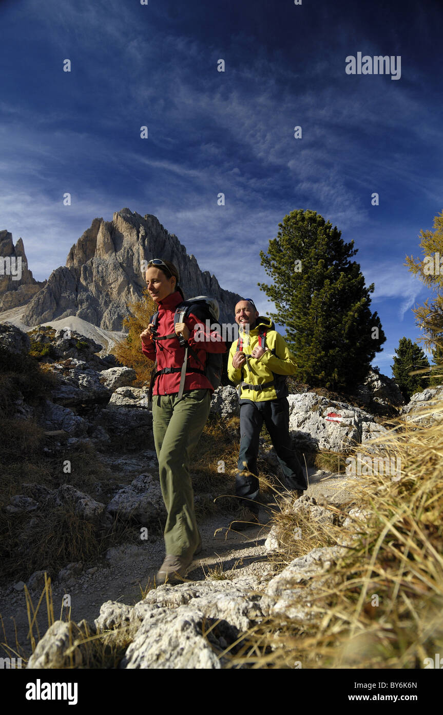 Mature couple mountain hiking, Dolomite Alps, Selva, Trentino-Alto ...