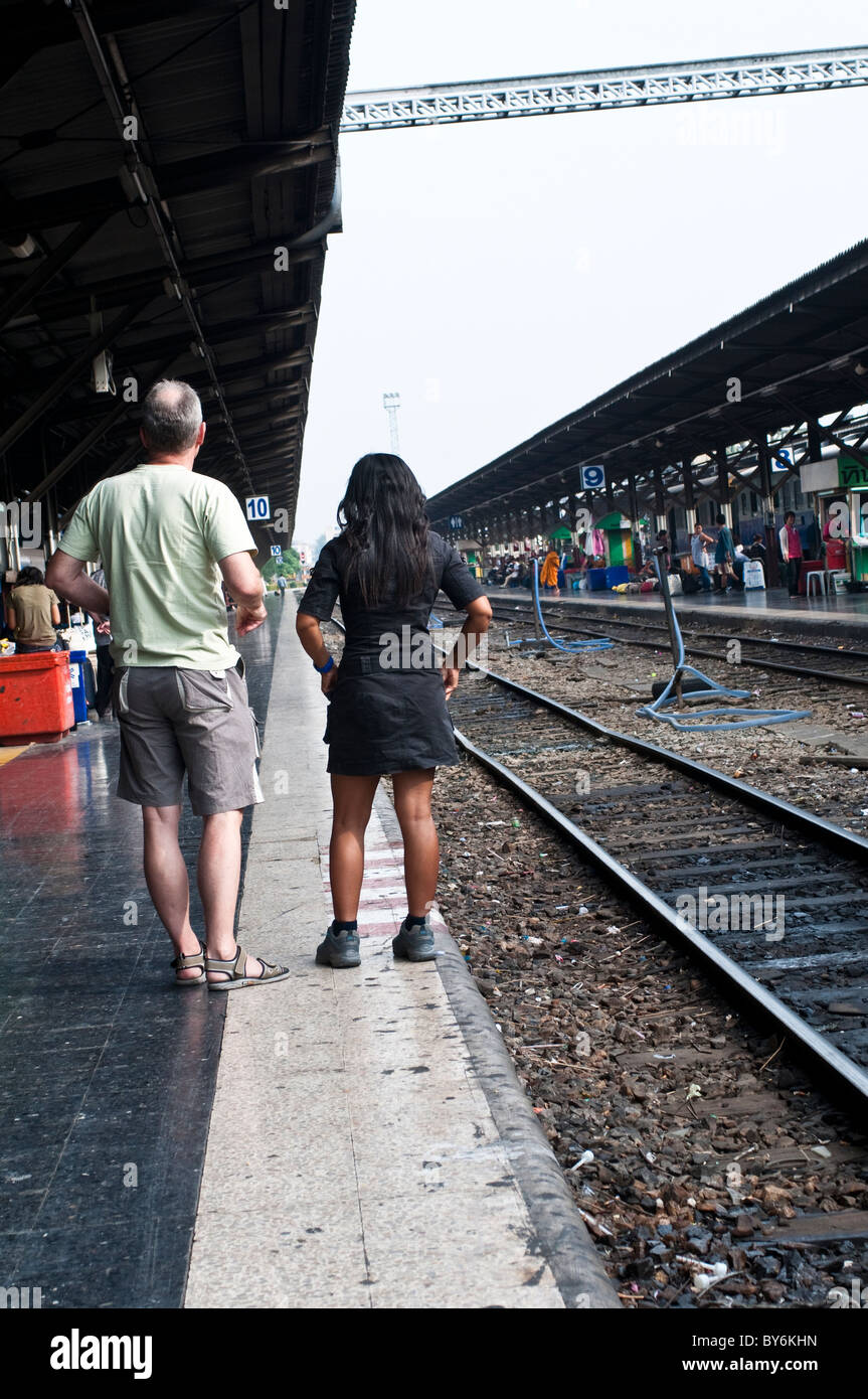 Passengers waiting for train at Bangkok railway station, Thailand Stock ...