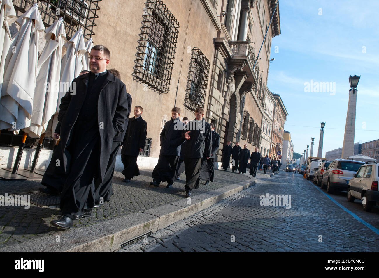 Vatican Priests walking street in row Rome Italy Europe Stock Photo - Alamy
