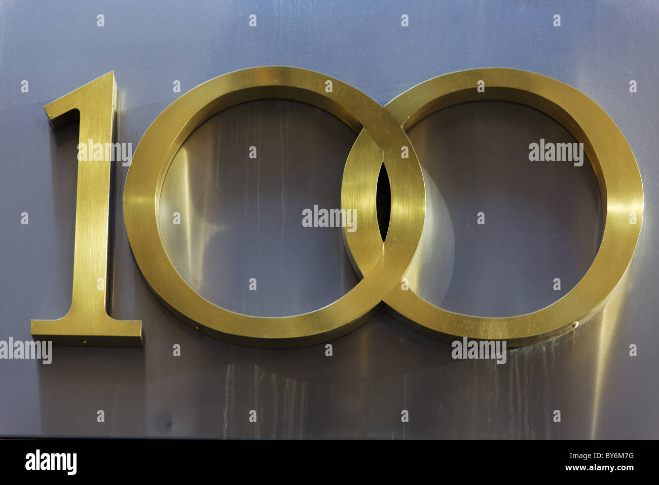 Door sign on the exterior wall of a building, 100, Chicago, Illinois ...