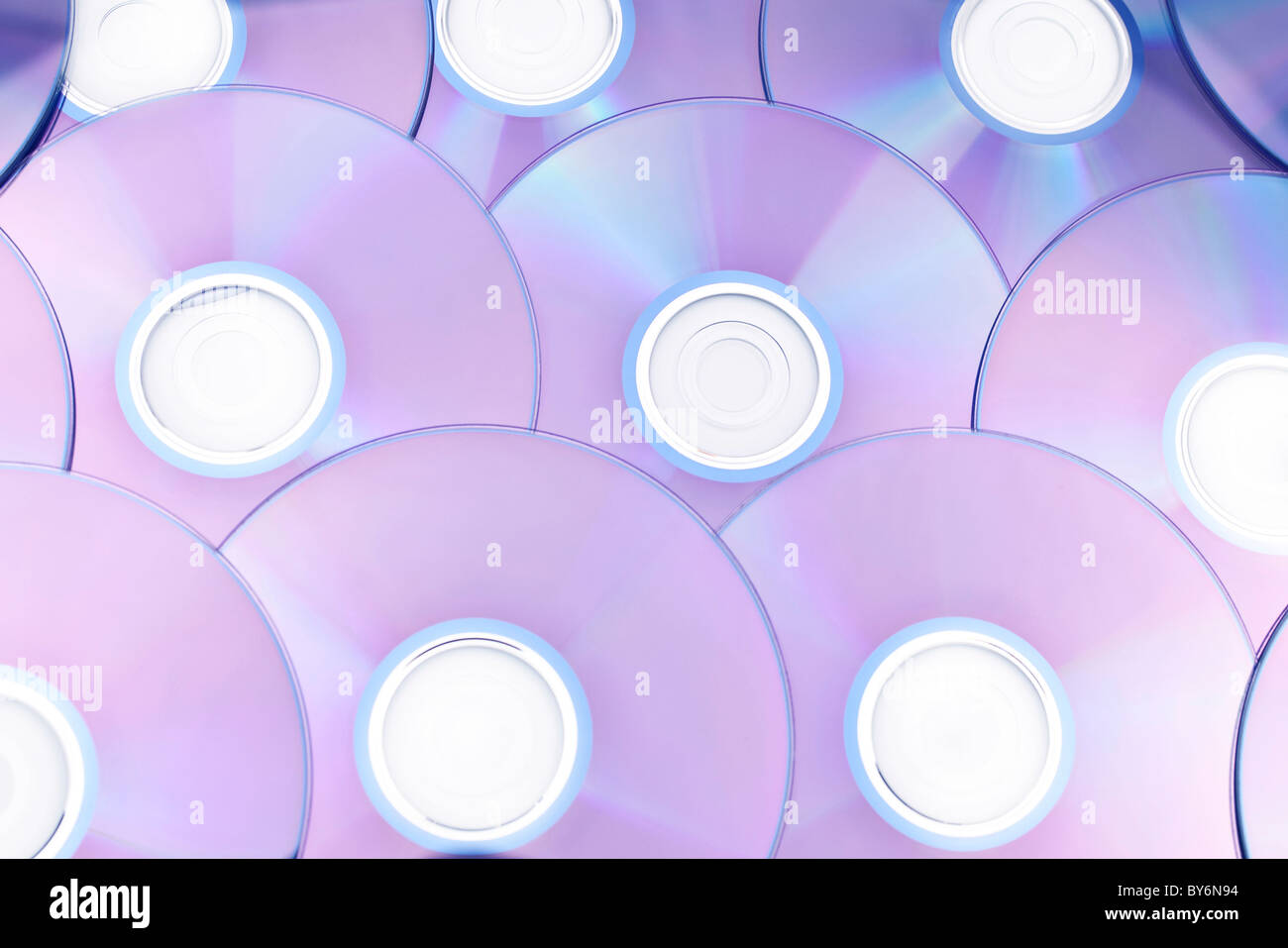 Background with violet cd close up Stock Photo - Alamy