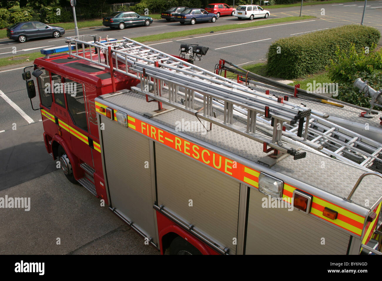 Fire engine leavign a station on a call Stock Photo - Alamy