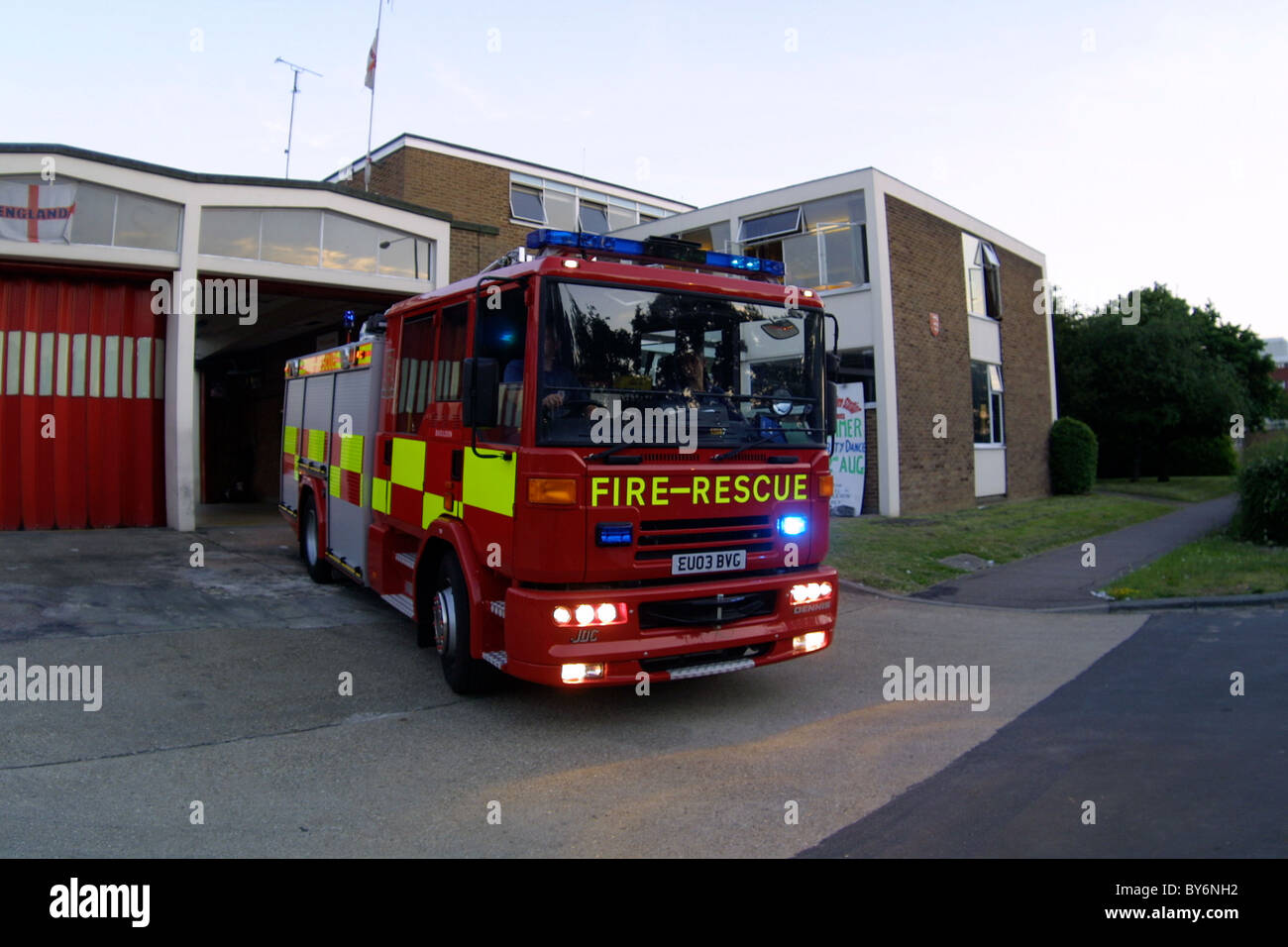 Fire engine going out on a call Stock Photo - Alamy