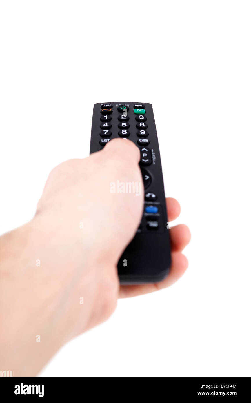 Hand holding television remote Isolated over white background Stock ...