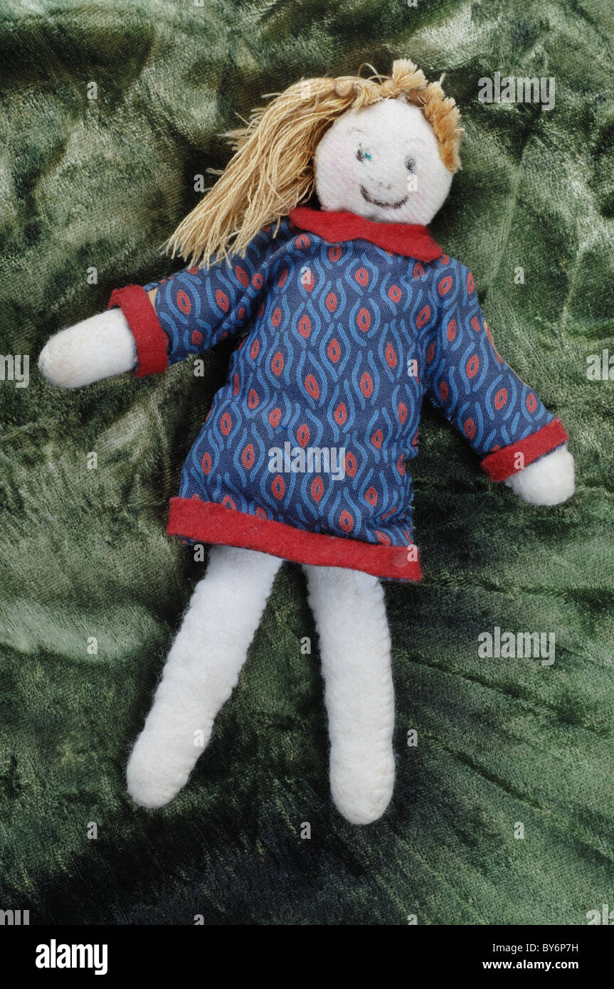 Doll lying down hi-res stock photography and images - Alamy