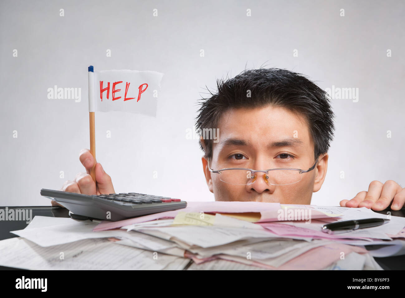 Businessman holding help flag hi-res stock photography and images - Alamy
