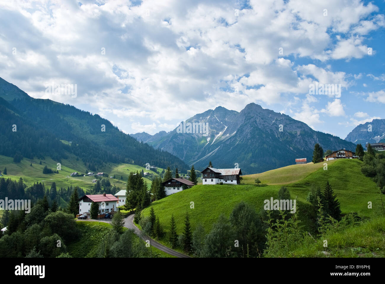 A small village in the austrian alps at the Kleinwalsertal Stock Photo ...