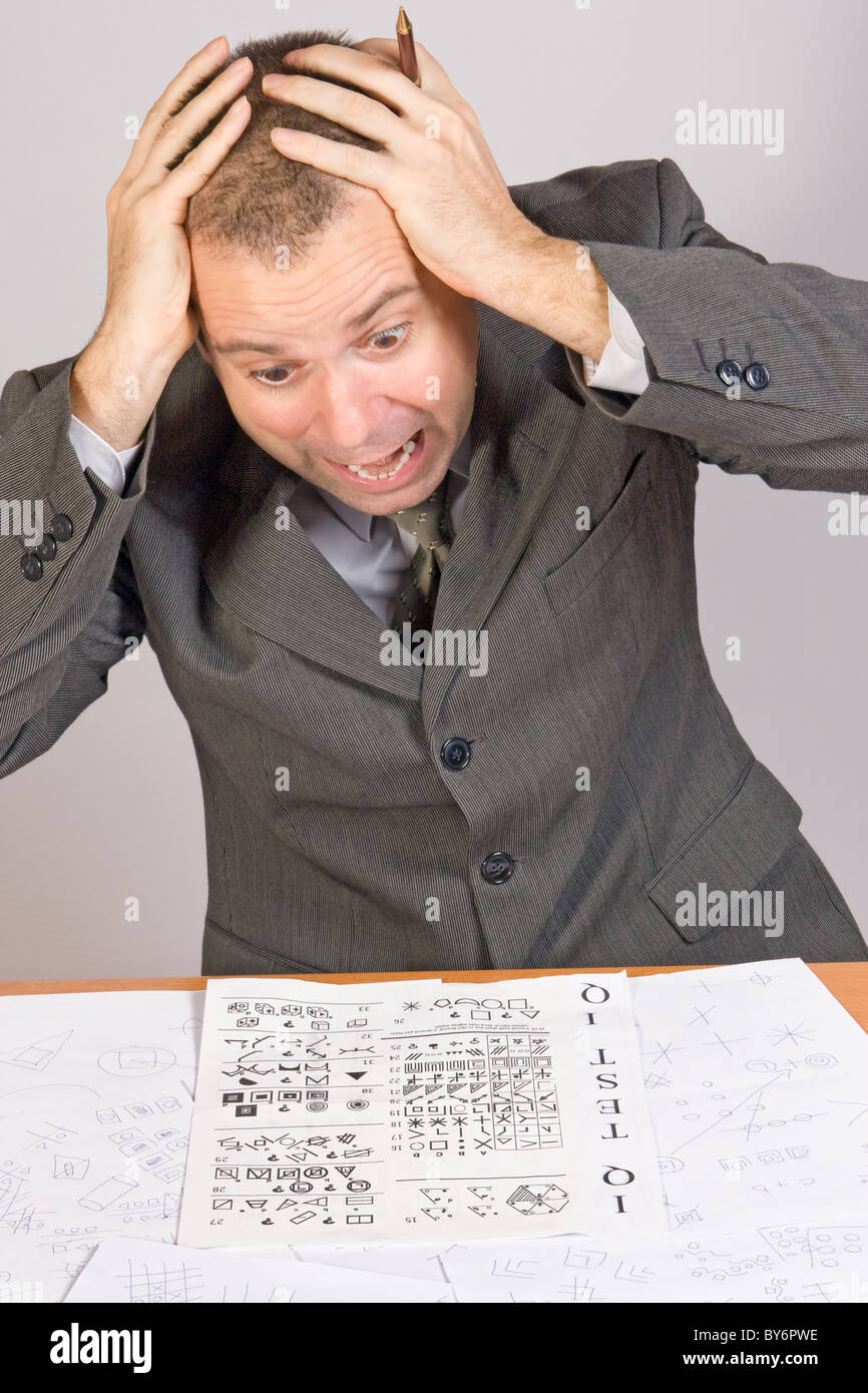 Unhappy man iq test hi-res stock photography and images - Alamy