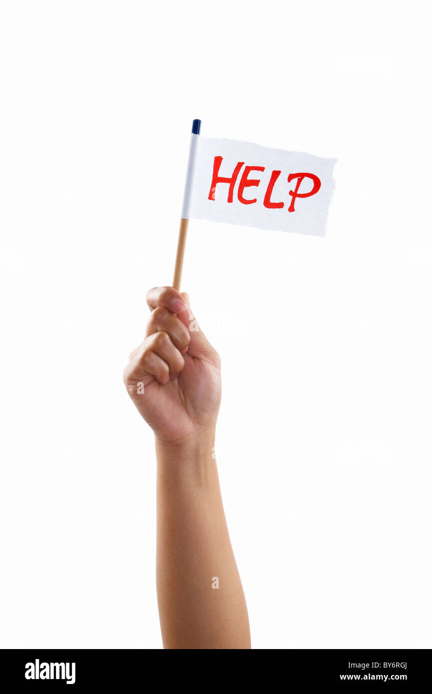 Hand holding help flag, shot aginst white background Stock Photo - Alamy