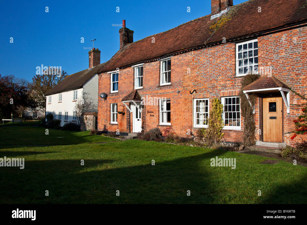 A row of red brick Georgian terraced cottages in the village of ...