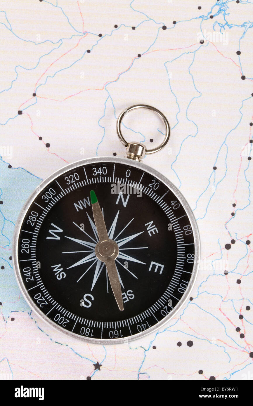 Compass and map close up shot by6rwh hi-res stock photography and ...