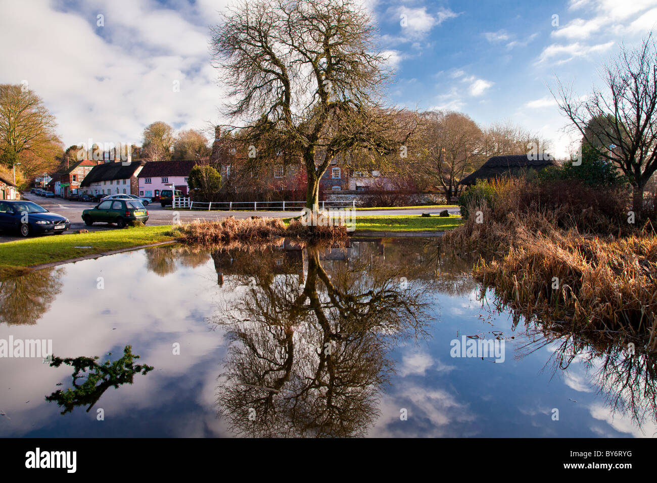 The village pond on a sunny day in winter in the village of Aldbourne ...