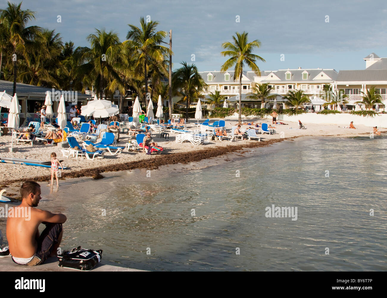 A busy tropical beach Stock Photo - Alamy