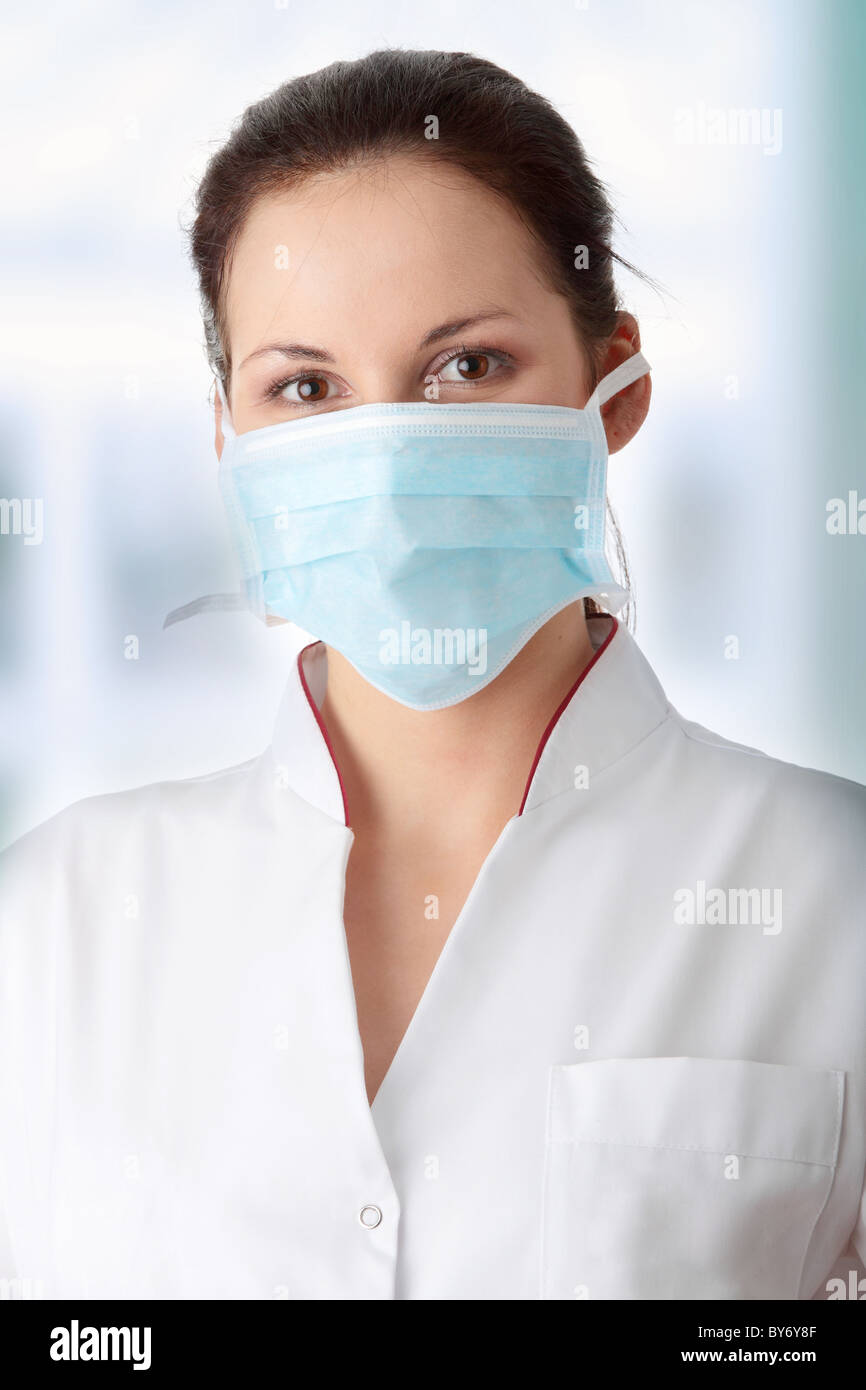 Young caucasian nurse in mask Stock Photo - Alamy