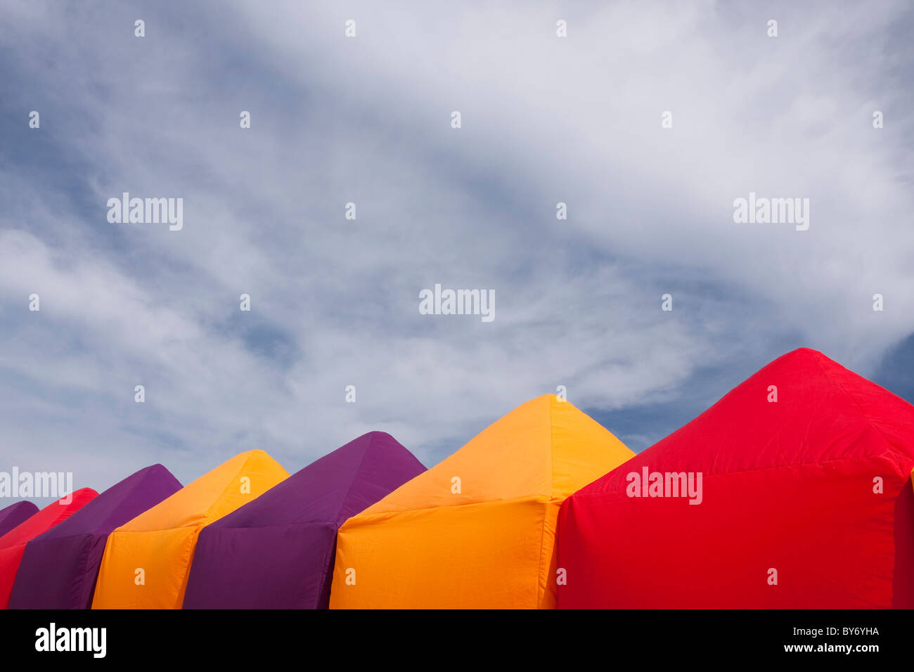 colorful tents in a summer day Stock Photo - Alamy