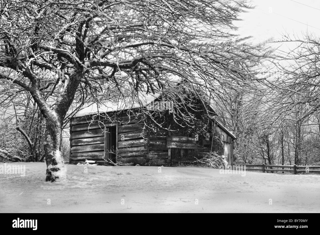 Black and White Log Cabin in snow Stock Photo - Alamy